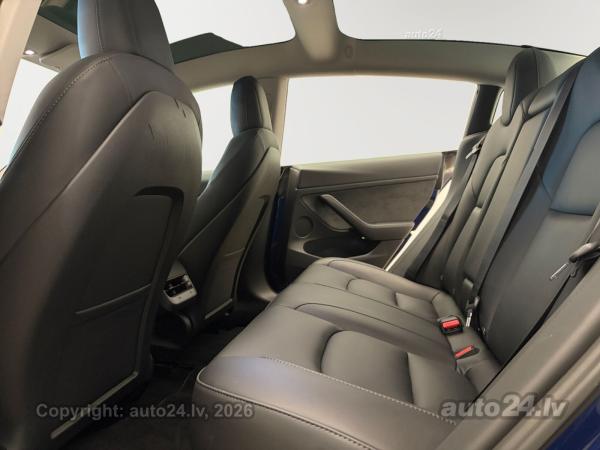 Blue Tesla Model 3 2023 in Tallinn, with an engine capacity of 0.00 L and mileage of 75 thousand km for 32900 €, photo 8 on AUTOMOTO.COM.LV