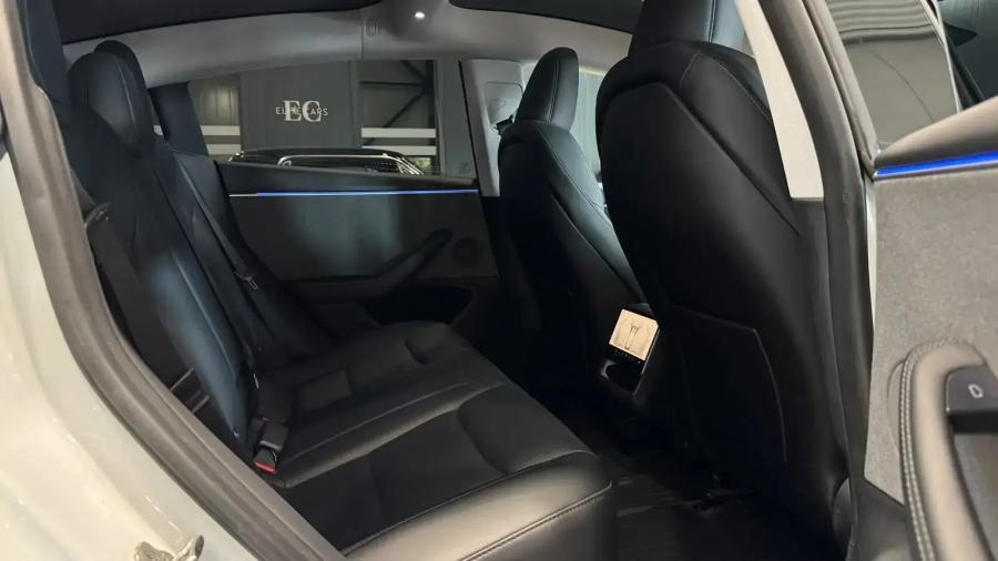 Blue Tesla Model 3 2023 in Marupe, with an engine capacity of 0.00 L and mileage of 57 thousand km for 32490 €, photo 11 on AUTOMOTO.COM.LV