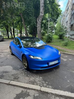 Синий Тесла Модель 3 2023 в Рига, объемом двигателя 0.00 л и пробегом 57 тыс. км за 30990 €, фото  на AUTOMOTO.COM.LV