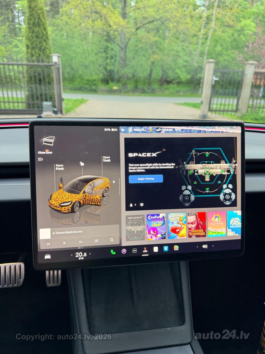 Blue Tesla Model 3 2024 in Tallinn, with an engine capacity of 0.00 L and mileage of 20 thousand km for 51900 €, photo 16 on AUTOMOTO.COM.LV