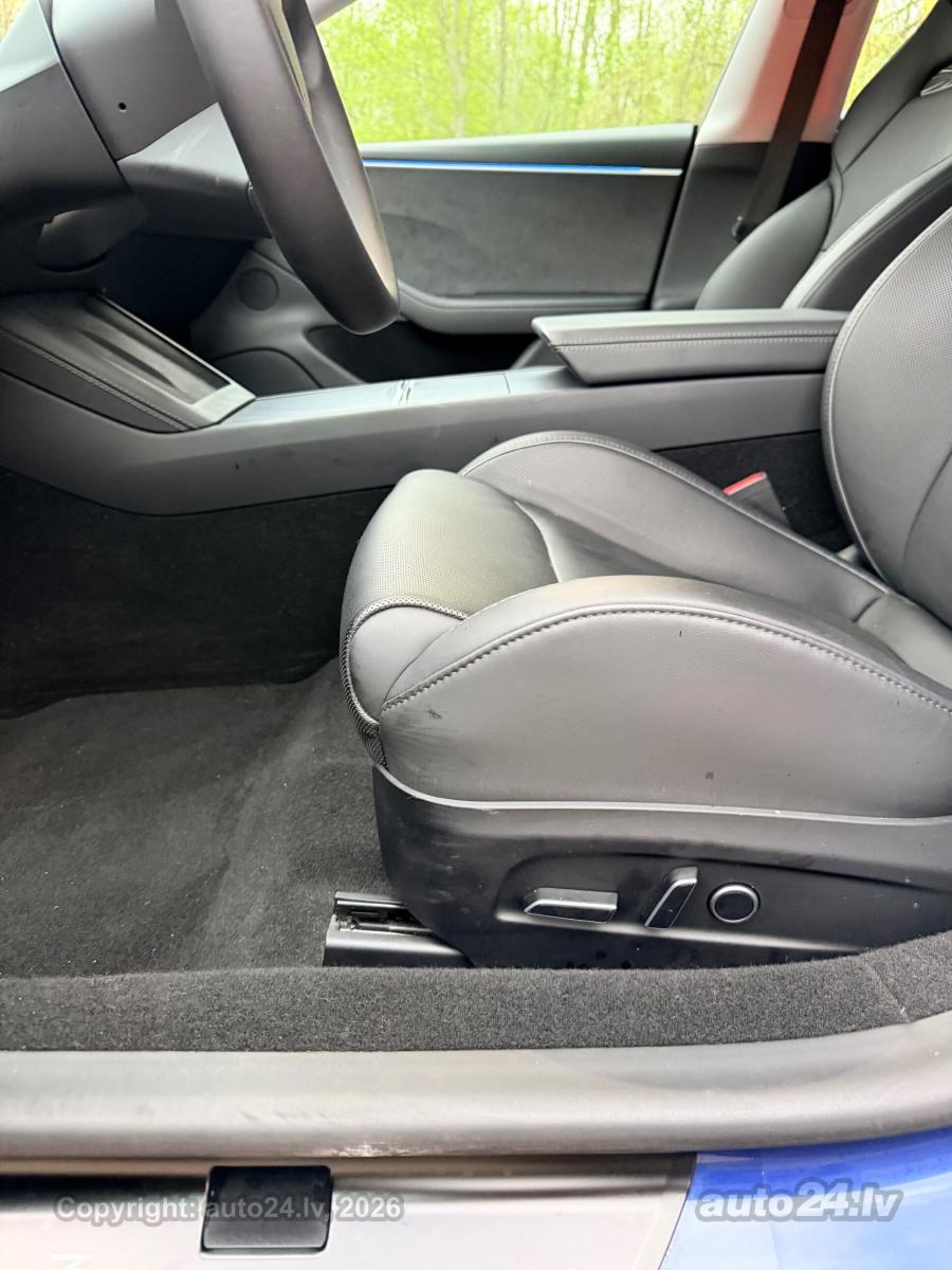 Blue Tesla Model 3 2024 in Tallinn, with an engine capacity of 0.00 L and mileage of 20 thousand km for 51900 €, photo 23 on AUTOMOTO.COM.LV