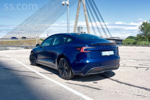 Blue Tesla Model 3 2024 in Riga, with an engine capacity of 0.00 L and mileage of 39 thousand km for 38000 €, photo 3 on AUTOMOTO.COM.LV