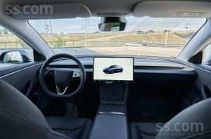 Blue Tesla Model 3 2024 in Riga, with an engine capacity of 0.00 L and mileage of 39 thousand km for 38000 €, photo 6 on AUTOMOTO.COM.LV
