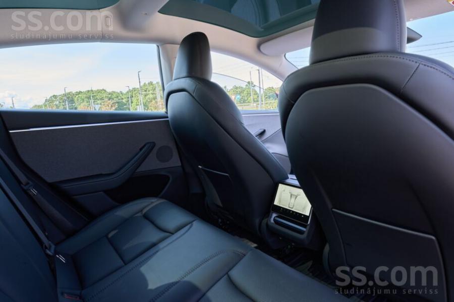 Blue Tesla Model 3 2024 in Riga, with an engine capacity of 0.00 L and mileage of 39 thousand km for 38000 €, photo 7 on AUTOMOTO.COM.LV