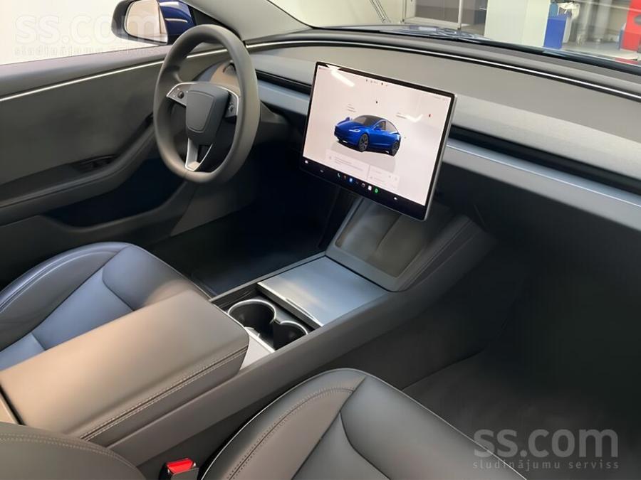 Blue Tesla Model 3 2024 in Riga, with an engine capacity of 0.00 L and mileage of 44 thousand km for 44900 €, photo 6 on AUTOMOTO.COM.LV