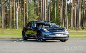 Grey Tesla Model 3 2020 in Riga, with an engine capacity of 0.00 L and mileage of 127 thousand km for 21990 €, photo  on AUTOMOTO.COM.LV