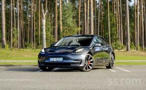 Grey Tesla Model 3 2020 in Riga, with an engine capacity of 0.00 L and mileage of 127 thousand km for 21990 €, photo 4 on AUTOMOTO.COM.LV