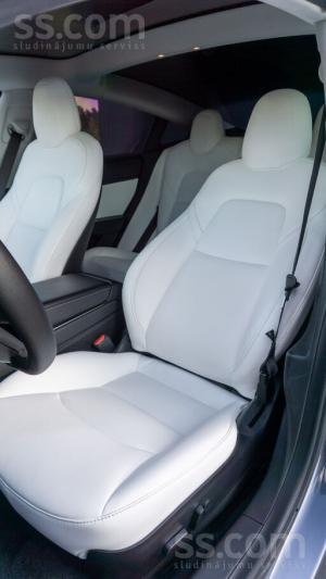 Grey Tesla Model 3 2020 in Riga, with an engine capacity of 0.00 L and mileage of 127 thousand km for 21990 €, photo 26 on AUTOMOTO.COM.LV
