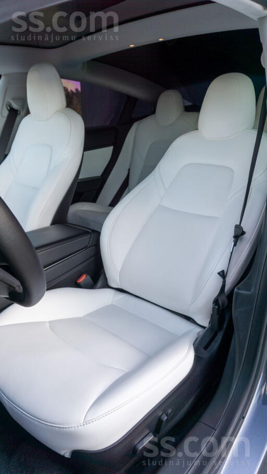 Grey Tesla Model 3 2020 in Riga, with an engine capacity of 0.00 L and mileage of 127 thousand km for 21990 €, photo 26 on AUTOMOTO.COM.LV