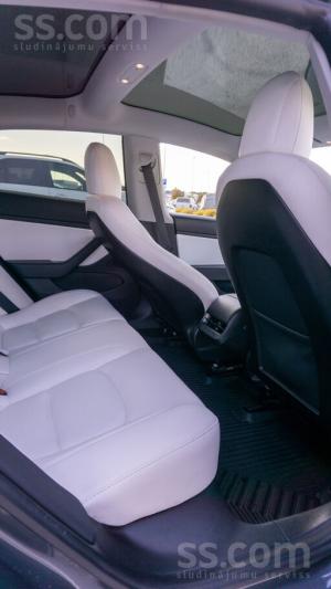 Grey Tesla Model 3 2020 in Riga, with an engine capacity of 0.00 L and mileage of 127 thousand km for 21990 €, photo 28 on AUTOMOTO.COM.LV