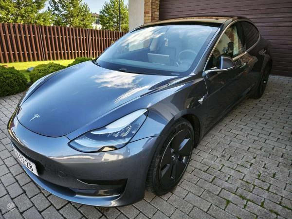 Pelēks Tesla Model 3 2020 Viļņa, ar dzinēja tilpumu 0.00 L un nobraukumu 99 tūkst. km par 19850 €, foto  vietnē AUTOMOTO.COM.LV