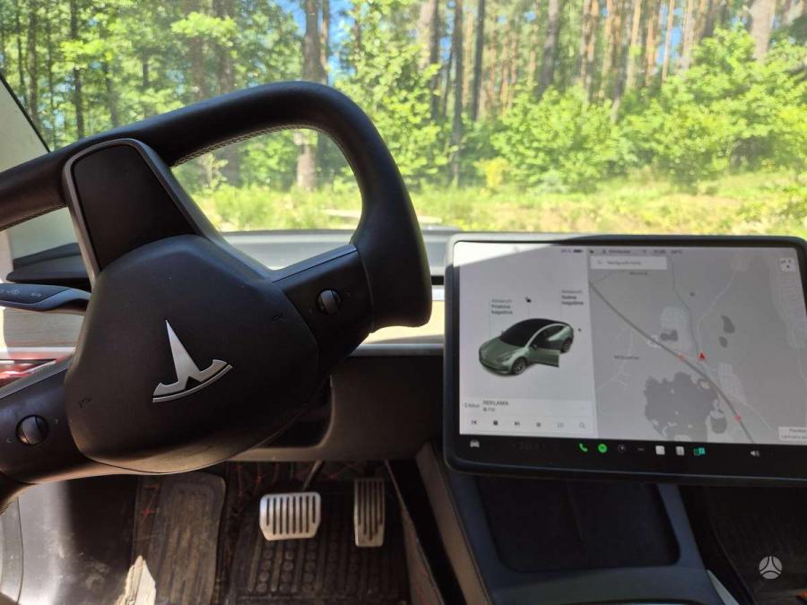 Grey Tesla Model 3 2021 in Vilnius, with an engine capacity of 0.00 L and mileage of 72 thousand km for 22000 €, photo 5 on AUTOMOTO.COM.LV