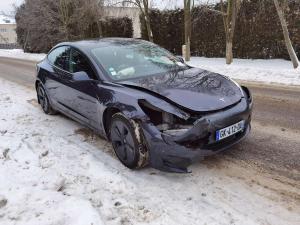 Grey Tesla Model 3 2022 in Kaunas, with an engine capacity of 0.00 L and mileage of 33 thousand km for 12300 €, photo 7 on AUTOMOTO.COM.LV