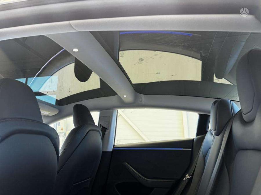 Grey Tesla Model 3 2023 in Radviliskis, with an engine capacity of 0.00 L and mileage of 80 thousand km for 20950 €, photo 16 on AUTOMOTO.COM.LV