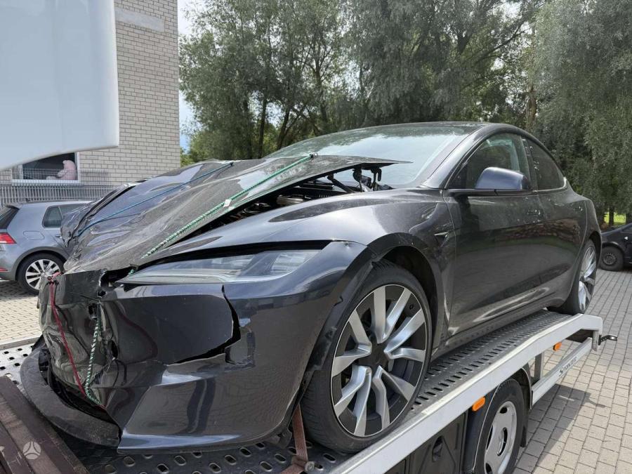 Grey Tesla Model 3 2023 in Marijampole, with an engine capacity of 0.00 L and mileage of 55 thousand km for 17900 €, photo 1 on AUTOMOTO.COM.LV