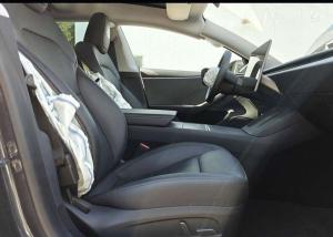 Grey Tesla Model 3 2023 in Marijampole, with an engine capacity of 0.00 L and mileage of 55 thousand km for 17900 €, photo 7 on AUTOMOTO.COM.LV
