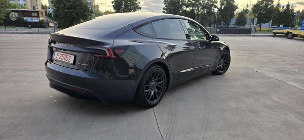Grey Tesla Model 3 2024 in Panevezys, with an engine capacity of 0.00 L and mileage of 163 thousand km for 26500 €, photo 4 on AUTOMOTO.COM.LV
