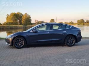 Grey Tesla Model 3 2020 in Liepaja, with an engine capacity of 0.00 L and mileage of 58 thousand km for 26000 €, photo 3 on AUTOMOTO.COM.LV
