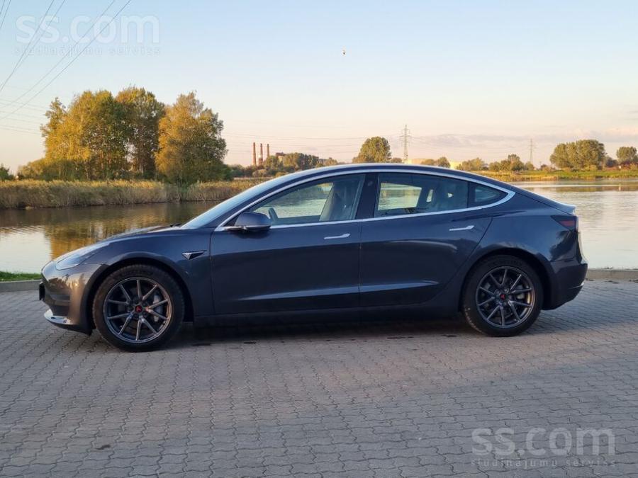 Grey Tesla Model 3 2020 in Liepaja, with an engine capacity of 0.00 L and mileage of 58 thousand km for 26000 €, photo 3 on AUTOMOTO.COM.LV