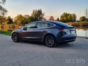 Grey Tesla Model 3 2020 in Liepaja, with an engine capacity of 0.00 L and mileage of 58 thousand km for 26000 €, photo 4 on AUTOMOTO.COM.LV