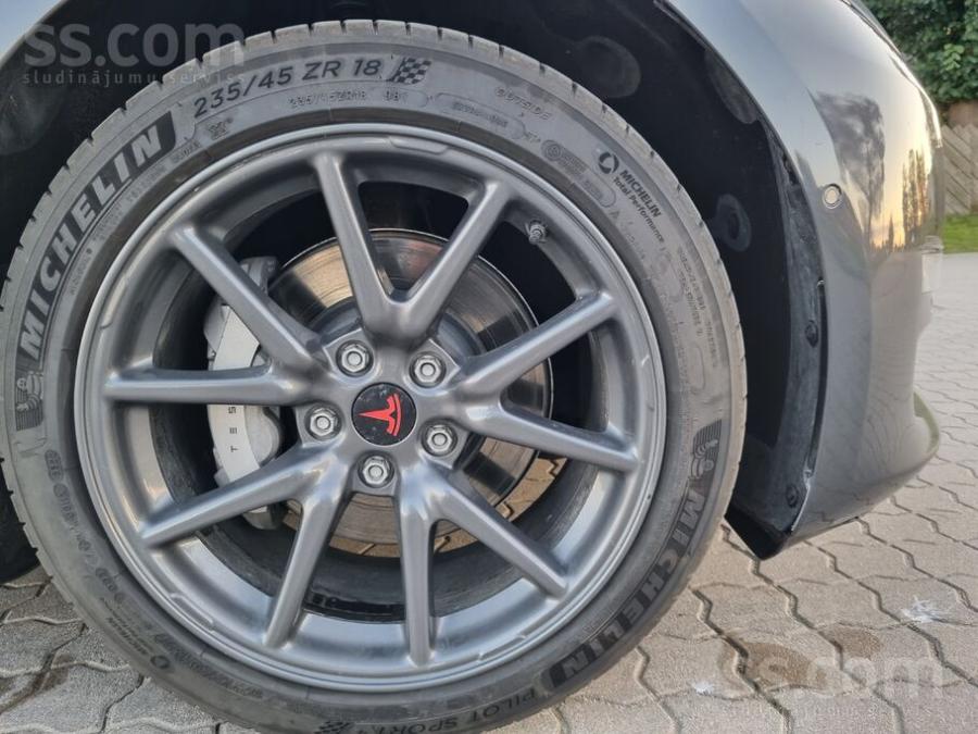 Grey Tesla Model 3 2020 in Liepaja, with an engine capacity of 0.00 L and mileage of 58 thousand km for 26000 €, photo 16 on AUTOMOTO.COM.LV