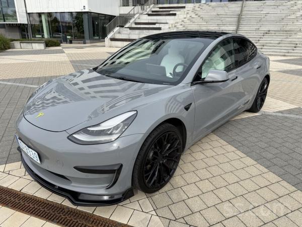 Grey Tesla Model 3 2020 in Riga, with an engine capacity of 0.00 L and mileage of 161 thousand km for 23000 €, photo 1 on AUTOMOTO.COM.LV