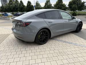 Grey Tesla Model 3 2020 in Riga, with an engine capacity of 0.00 L and mileage of 161 thousand km for 23000 €, photo 4 on AUTOMOTO.COM.LV