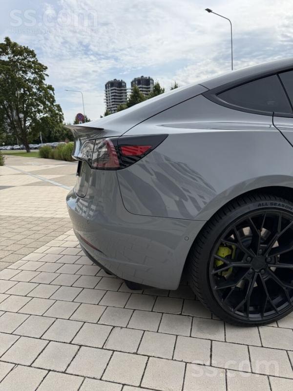 Grey Tesla Model 3 2020 in Riga, with an engine capacity of 0.00 L and mileage of 161 thousand km for 23000 €, photo 7 on AUTOMOTO.COM.LV