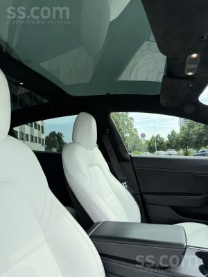 Grey Tesla Model 3 2020 in Riga, with an engine capacity of 0.00 L and mileage of 161 thousand km for 23000 €, photo 12 on AUTOMOTO.COM.LV