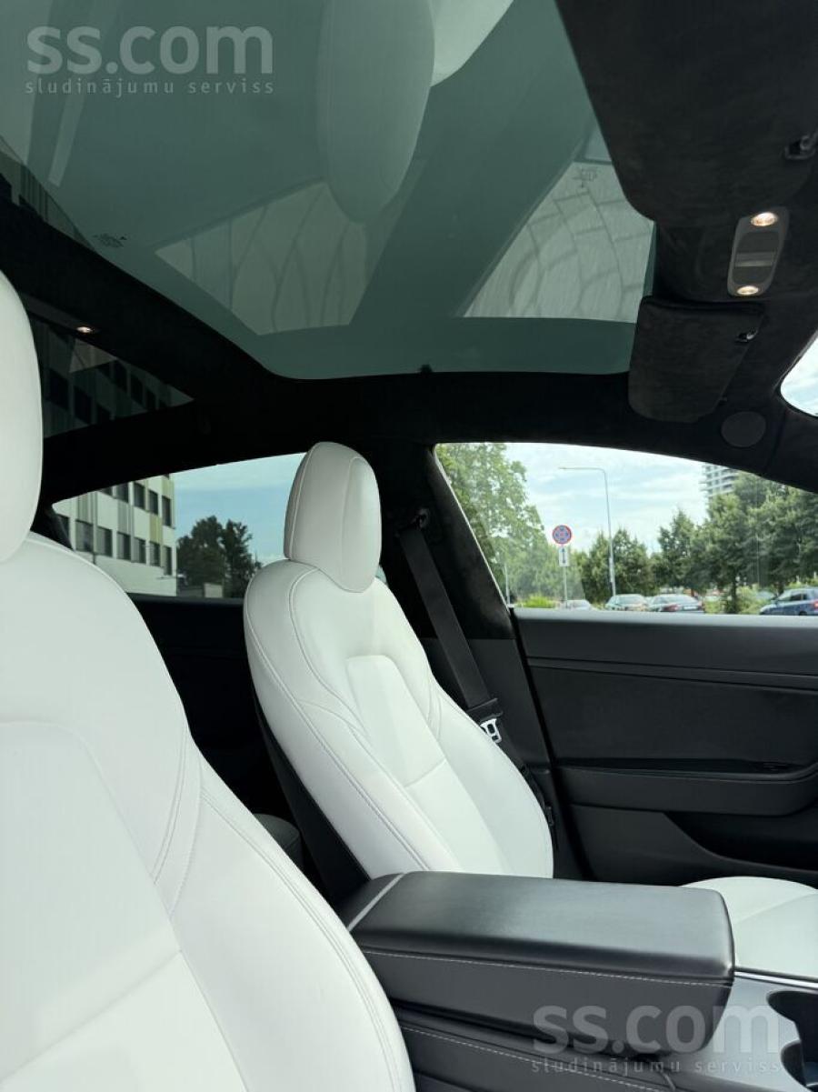 Grey Tesla Model 3 2020 in Riga, with an engine capacity of 0.00 L and mileage of 161 thousand km for 23000 €, photo 12 on AUTOMOTO.COM.LV