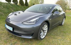Grey Tesla Model 3 2020 in Riga, with an engine capacity of 0.00 L and mileage of 86 thousand km for 23999 €, photo 5 on AUTOMOTO.COM.LV
