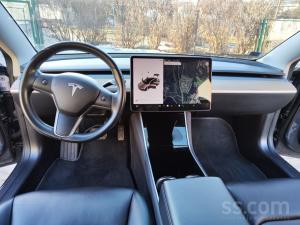 Grey Tesla Model 3 2020 in Riga, with an engine capacity of 0.00 L and mileage of 86 thousand km for 23999 €, photo 7 on AUTOMOTO.COM.LV