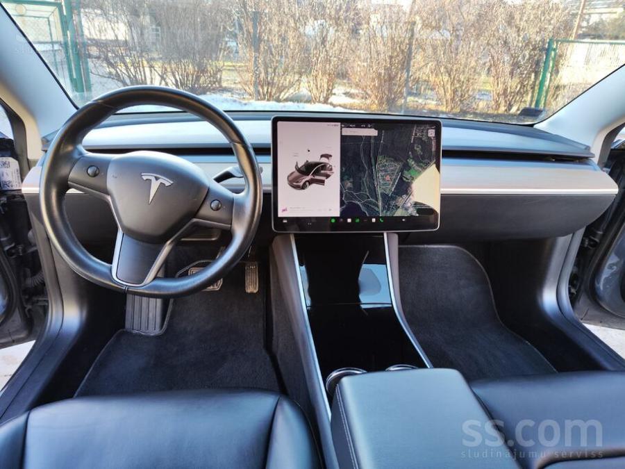 Grey Tesla Model 3 2020 in Riga, with an engine capacity of 0.00 L and mileage of 86 thousand km for 23999 €, photo 7 on AUTOMOTO.COM.LV