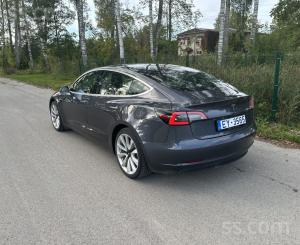 Grey Tesla Model 3 2020 in Ogre, with an engine capacity of 0.00 L and mileage of 99 thousand km for 24500 €, photo 4 on AUTOMOTO.COM.LV