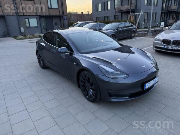 Pelēks Tesla Model 3 2021 Rīga, ar dzinēja tilpumu 0.00 L un nobraukumu 57 tūkst. km par 32000 €, foto 1 vietnē AUTOMOTO.COM.LV