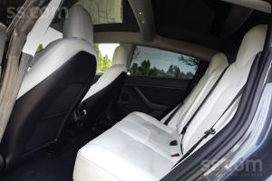 Grey Tesla Model 3 2021 in Jelgava, with an engine capacity of 0.00 L and mileage of 135 thousand km for 27600 €, photo 14 on AUTOMOTO.COM.LV