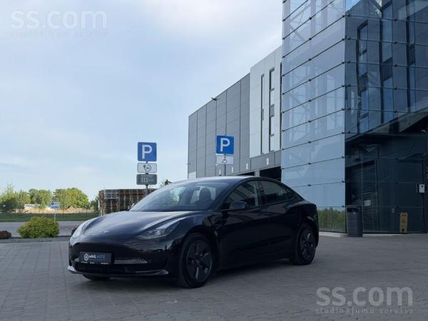 Grey Tesla Model 3 2022 in Riga, with an engine capacity of 0.00 L and mileage of 56 thousand km for 28900 €, photo 4 on AUTOMOTO.COM.LV