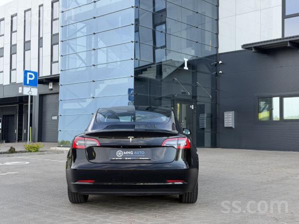 Grey Tesla Model 3 2022 in Riga, with an engine capacity of 0.00 L and mileage of 56 thousand km for 28900 €, photo 5 on AUTOMOTO.COM.LV