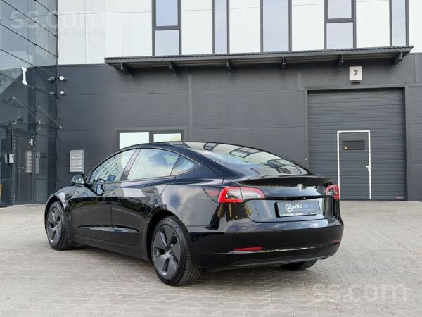 Grey Tesla Model 3 2022 in Riga, with an engine capacity of 0.00 L and mileage of 56 thousand km for 28900 €, photo 6 on AUTOMOTO.COM.LV