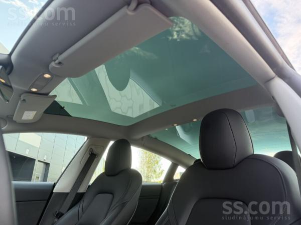 Grey Tesla Model 3 2022 in Riga, with an engine capacity of 0.00 L and mileage of 56 thousand km for 28900 €, photo 9 on AUTOMOTO.COM.LV