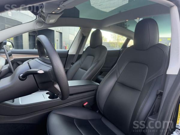 Grey Tesla Model 3 2022 in Riga, with an engine capacity of 0.00 L and mileage of 56 thousand km for 28900 €, photo 10 on AUTOMOTO.COM.LV