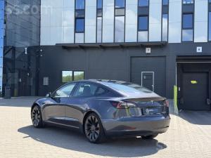 Grey Tesla Model 3 2022 in Riga, with an engine capacity of 0.00 L and mileage of 50 thousand km for 34900 €, photo 8 on AUTOMOTO.COM.LV