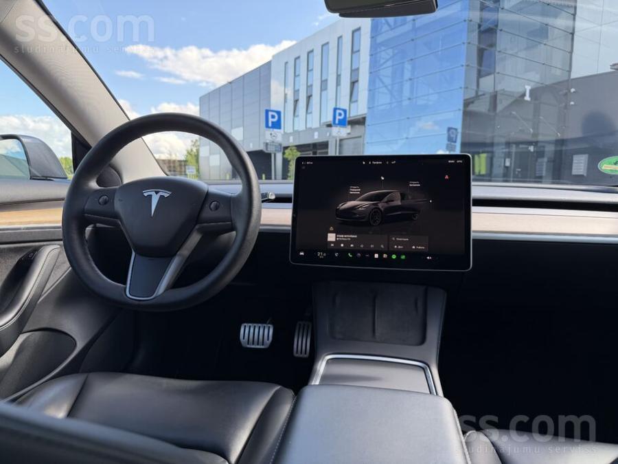 Grey Tesla Model 3 2022 in Riga, with an engine capacity of 0.00 L and mileage of 50 thousand km for 34900 €, photo 10 on AUTOMOTO.COM.LV