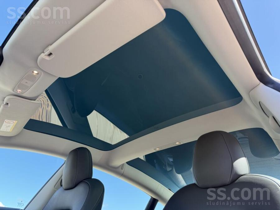 Grey Tesla Model 3 2022 in Riga, with an engine capacity of 0.00 L and mileage of 50 thousand km for 34900 €, photo 12 on AUTOMOTO.COM.LV