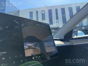 Grey Tesla Model 3 2022 in Riga, with an engine capacity of 0.00 L and mileage of 50 thousand km for 34900 €, photo 18 on AUTOMOTO.COM.LV