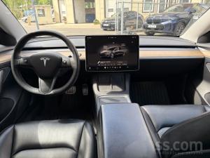 Grey Tesla Model 3 2022 in Riga, with an engine capacity of 0.00 L and mileage of 124 thousand km for 27300 €, photo 6 on AUTOMOTO.COM.LV