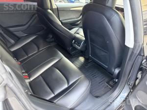 Grey Tesla Model 3 2022 in Riga, with an engine capacity of 0.00 L and mileage of 124 thousand km for 27300 €, photo 8 on AUTOMOTO.COM.LV