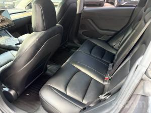 Grey Tesla Model 3 2022 in Riga, with an engine capacity of 0.00 L and mileage of 124 thousand km for 27300 €, photo 10 on AUTOMOTO.COM.LV