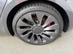 Grey Tesla Model 3 2022 in Riga, with an engine capacity of 0.00 L and mileage of 124 thousand km for 27300 €, photo 11 on AUTOMOTO.COM.LV