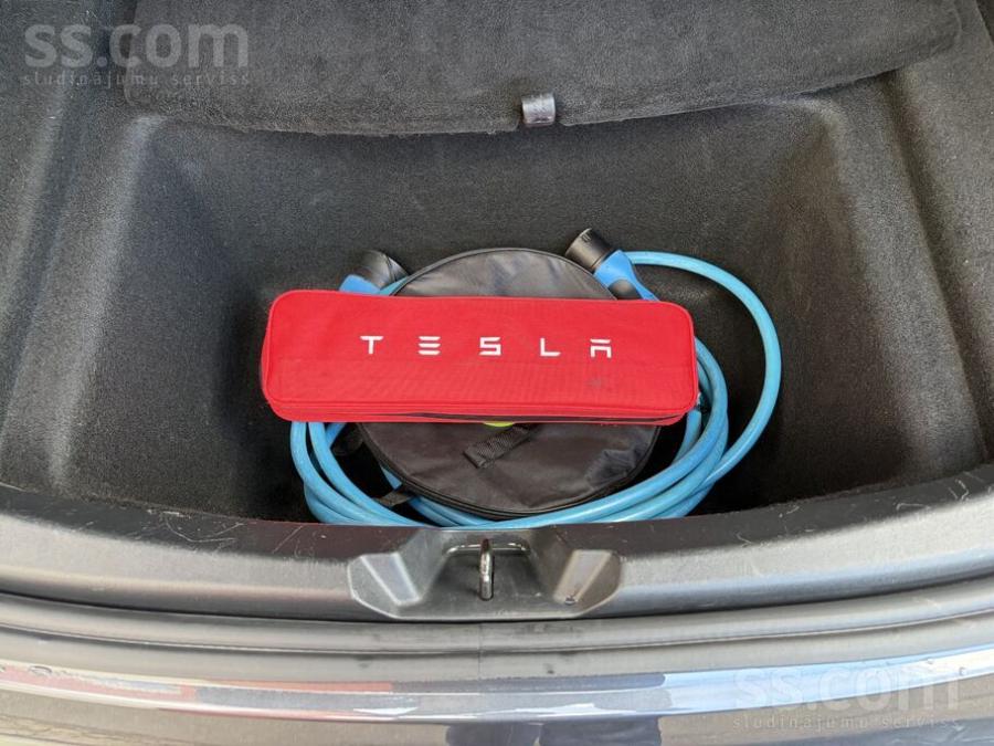 Grey Tesla Model 3 2022 in Riga, with an engine capacity of 0.00 L and mileage of 124 thousand km for 27300 €, photo 12 on AUTOMOTO.COM.LV